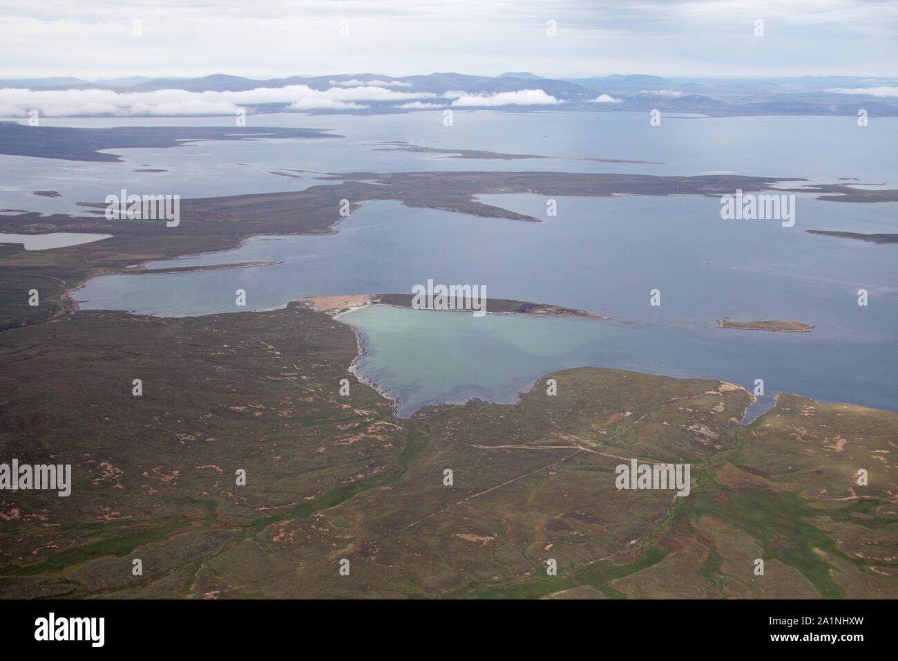 Aerial view over Saunders Island to Byron Sound Falkland Islands Stock ...