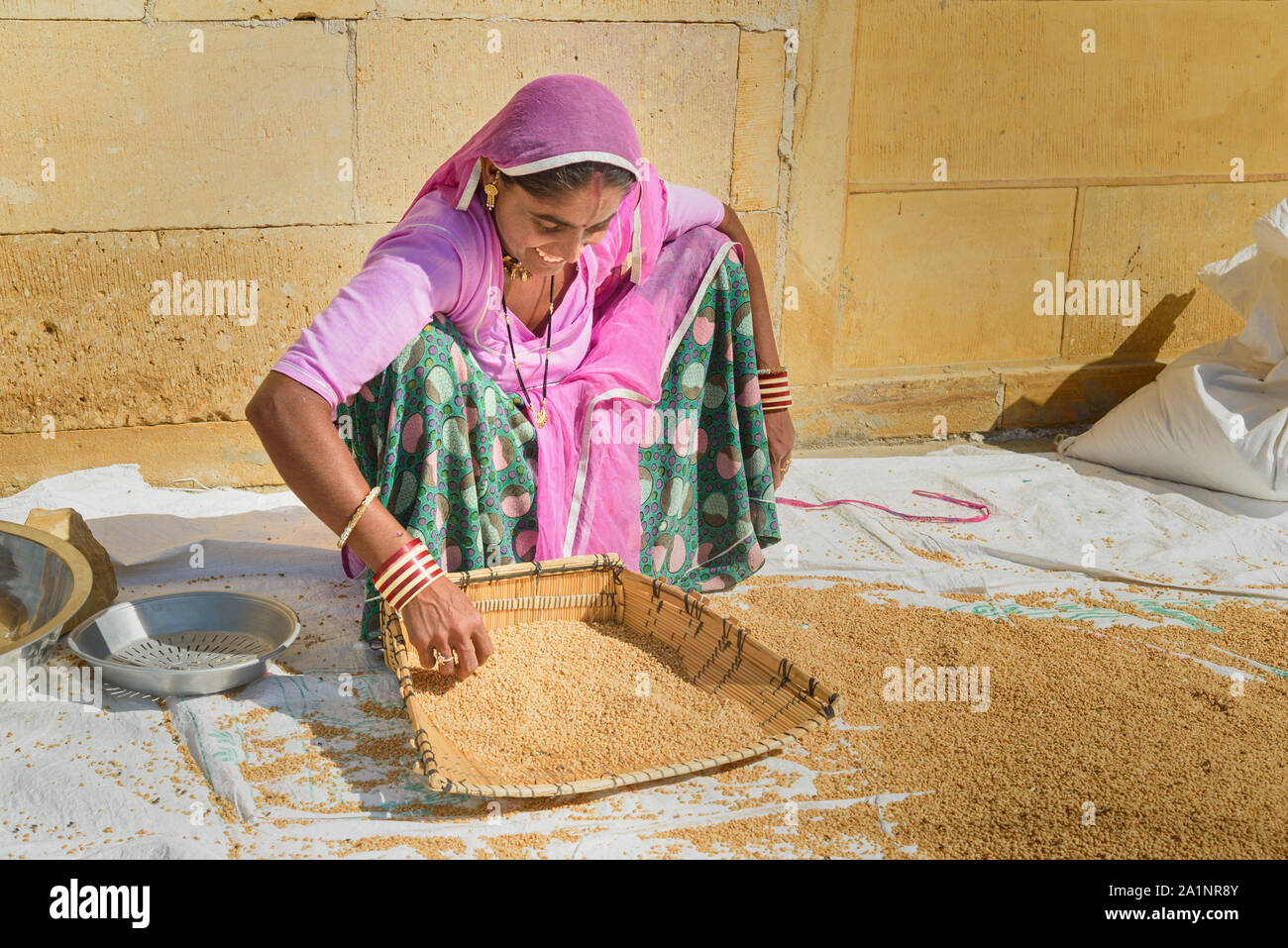 Indian woman cleaning street hi-res stock photography and images - Alamy