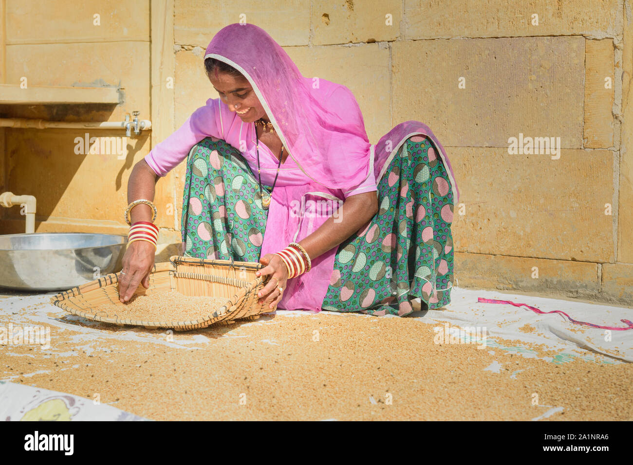 Indian woman cleaning street hi-res stock photography and images - Alamy