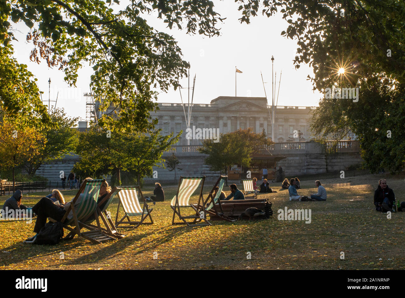Sunbathers enjoy the last of the summer sun in September in St James ...