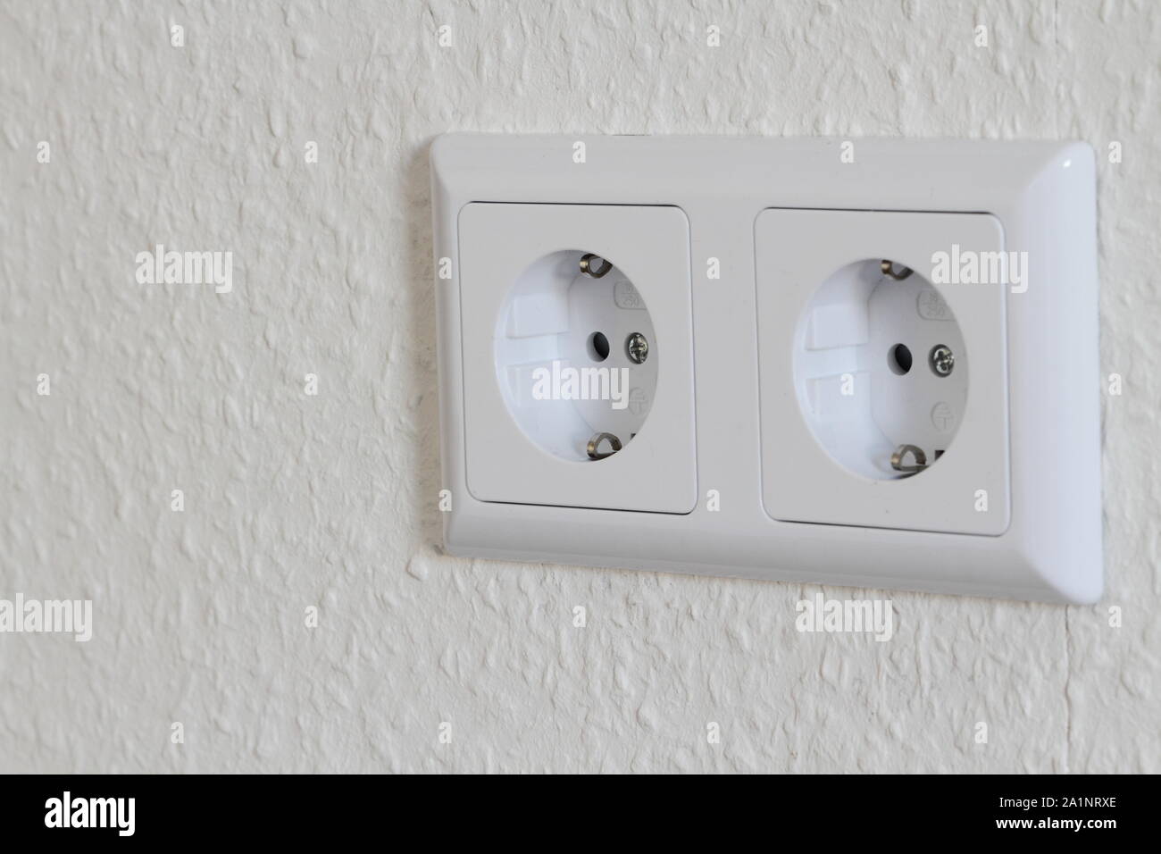 a empty white double socket Stock Photo - Alamy