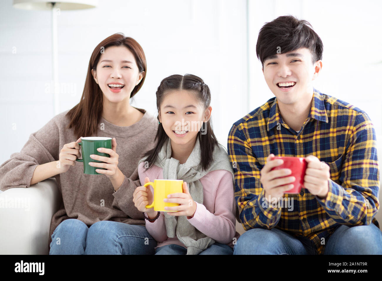 Happy asian family with daughter at home Stock Photo - Alamy
