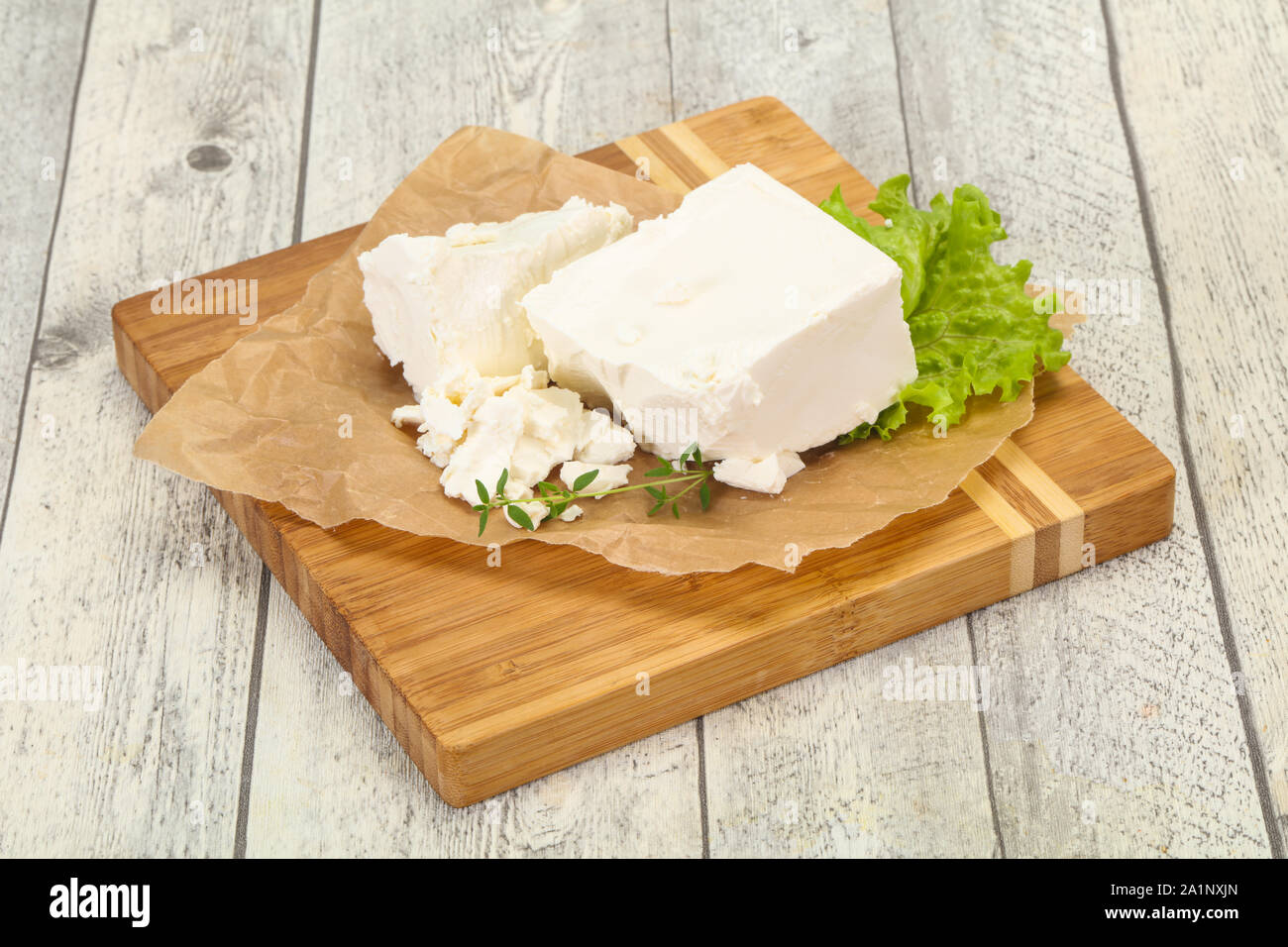 Greek traditional Feta soft cheese in the plate Stock Photo - Alamy