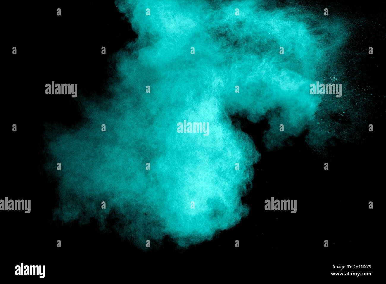 Green powder explosion on black background.Green dust particles splash ...