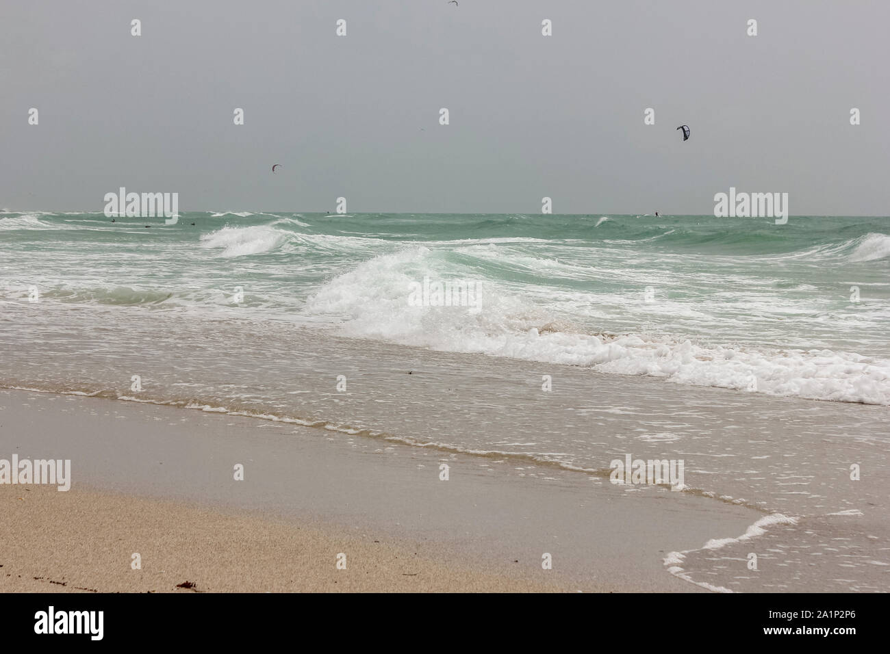 Waves of ocean on beach during daytime Stock Photo - Alamy