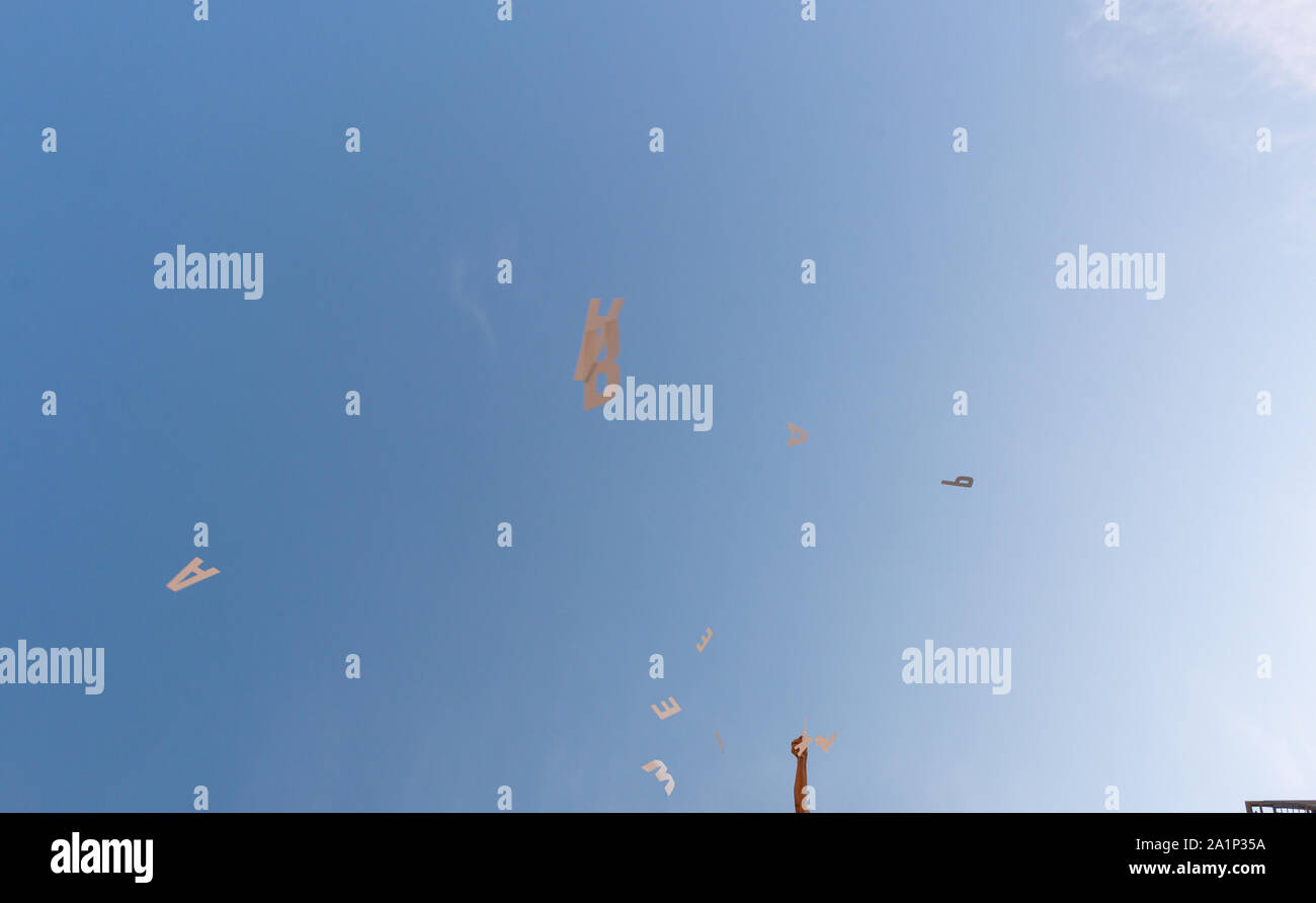 letters in the sky falling Stock Photo - Alamy