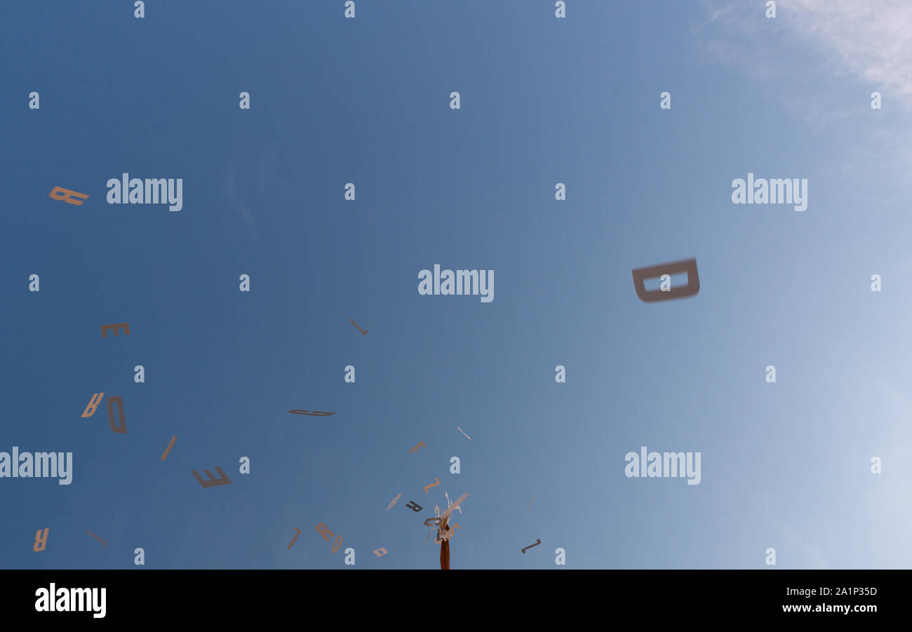 letters in the sky falling Stock Photo - Alamy