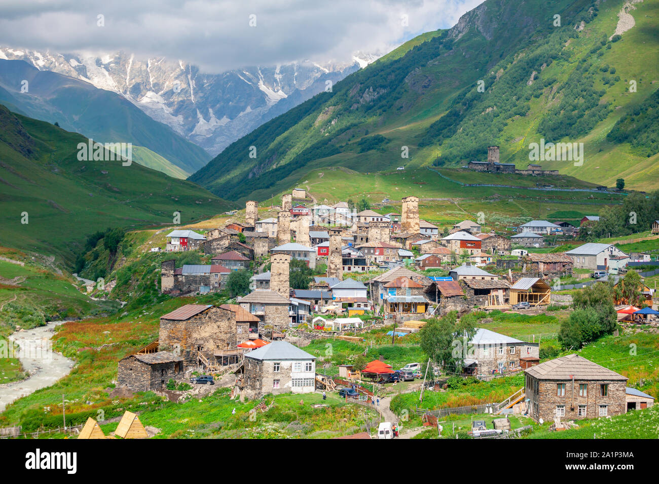 View of the Ushguli village at the foot of Mt. Shkhara. Picturesque and ...