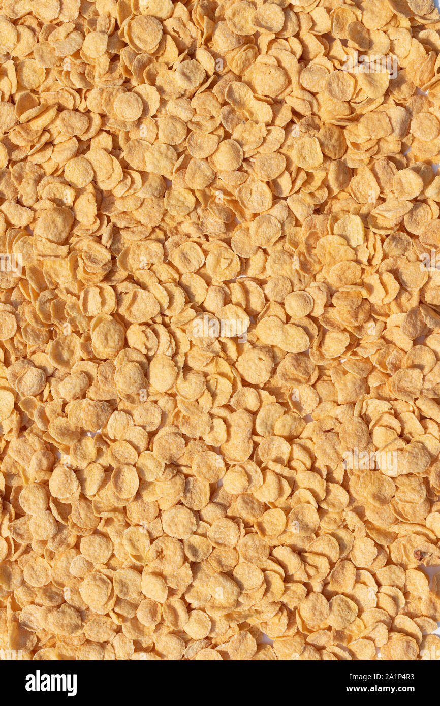 Natural yellow solid background of corn flakes Stock Photo - Alamy