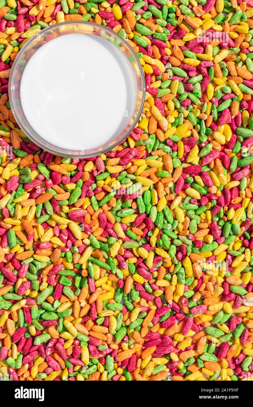 Background from multi-colored rice and cups of milk Stock Photo - Alamy