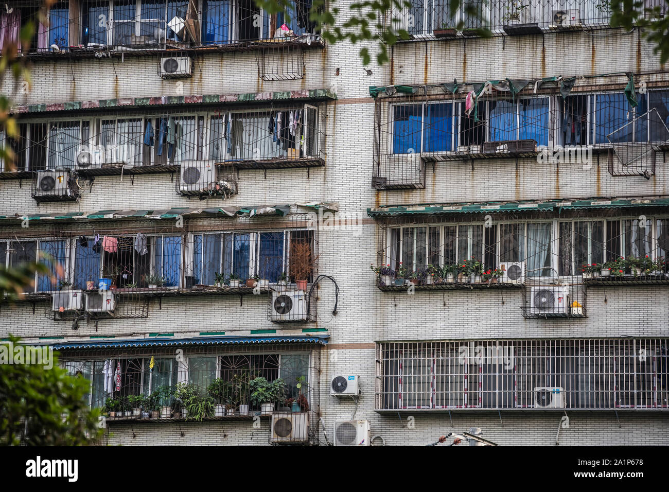 Windows and balconies of old residential buildings and blocks of flats ...