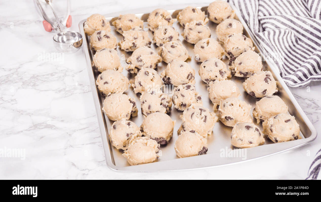 Step by step. Scooping homemade chocolate chip cookies with metal dough ...