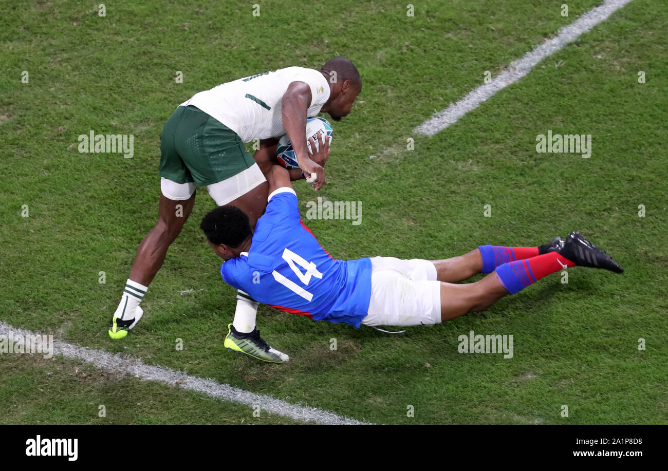 South Africa's Makazole Mapimpi is tackled by Namibia's Chad Plato ...