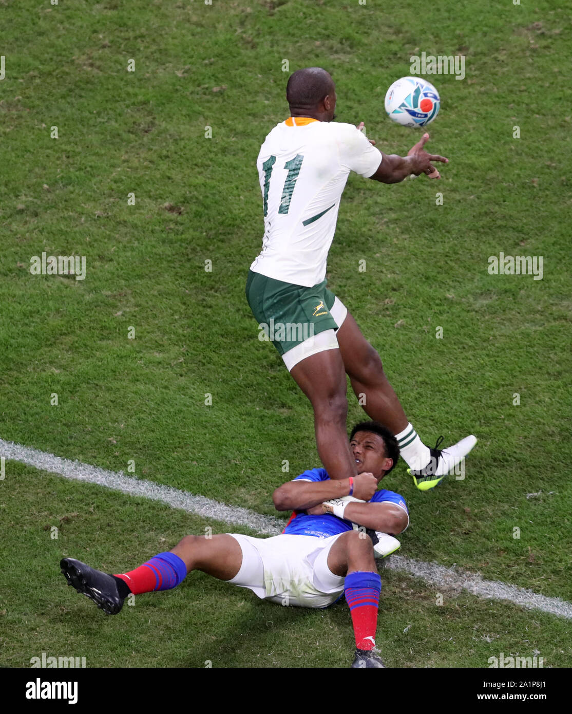 South Africa's Makazole Mapimpi is tackled by Namibia's Chad Plato ...