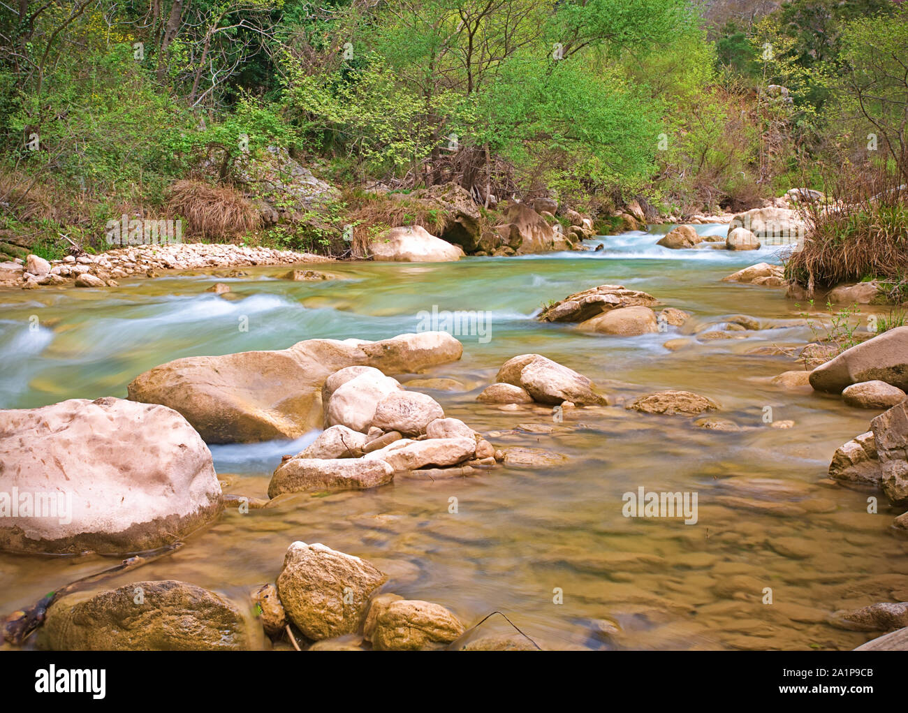 Water flow and rocks in Neda river, Peloponnese, Greece Stock Photo - Alamy
