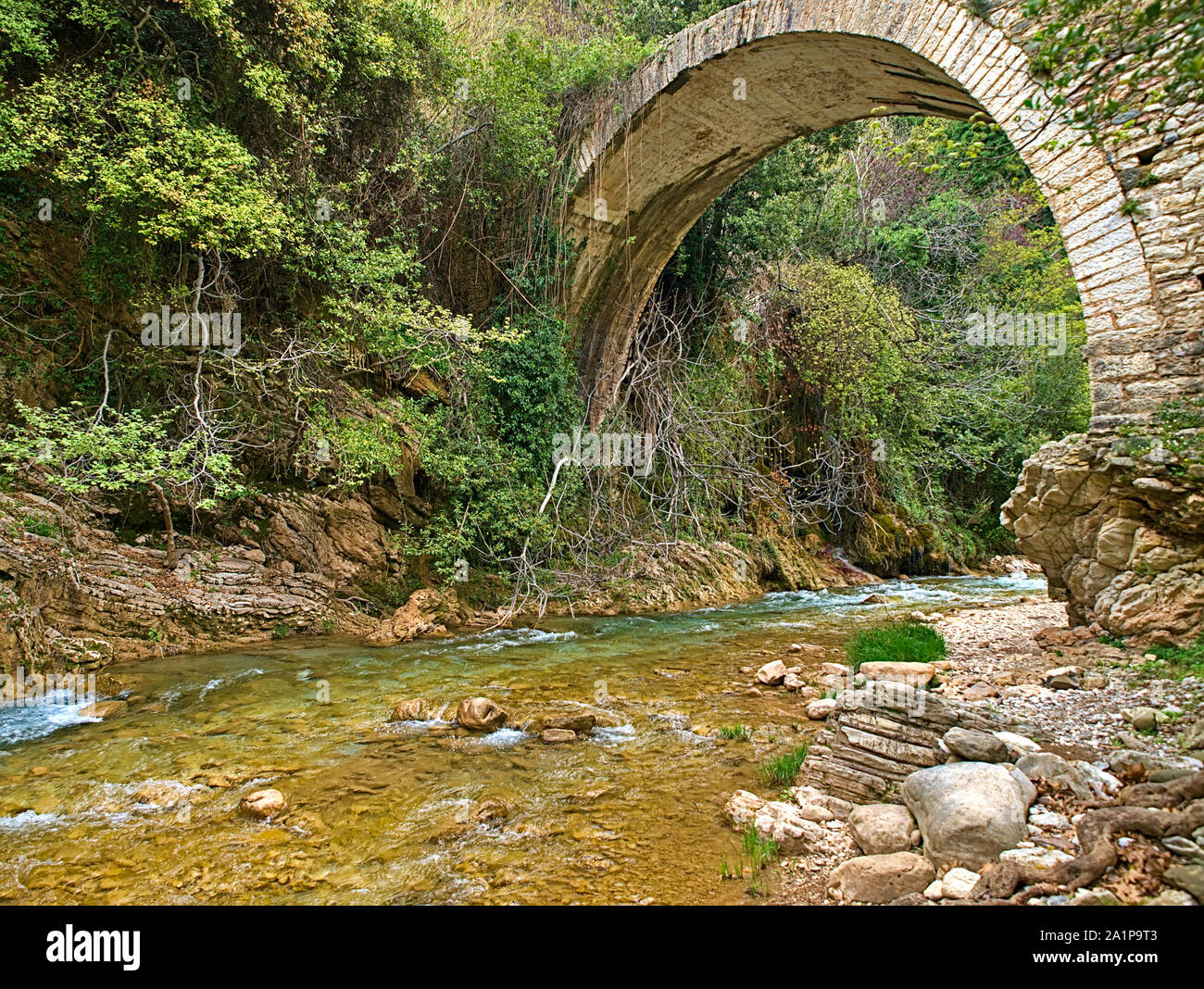 Traditional arch stone bridge above Neda river in Peloponnese, Greece ...