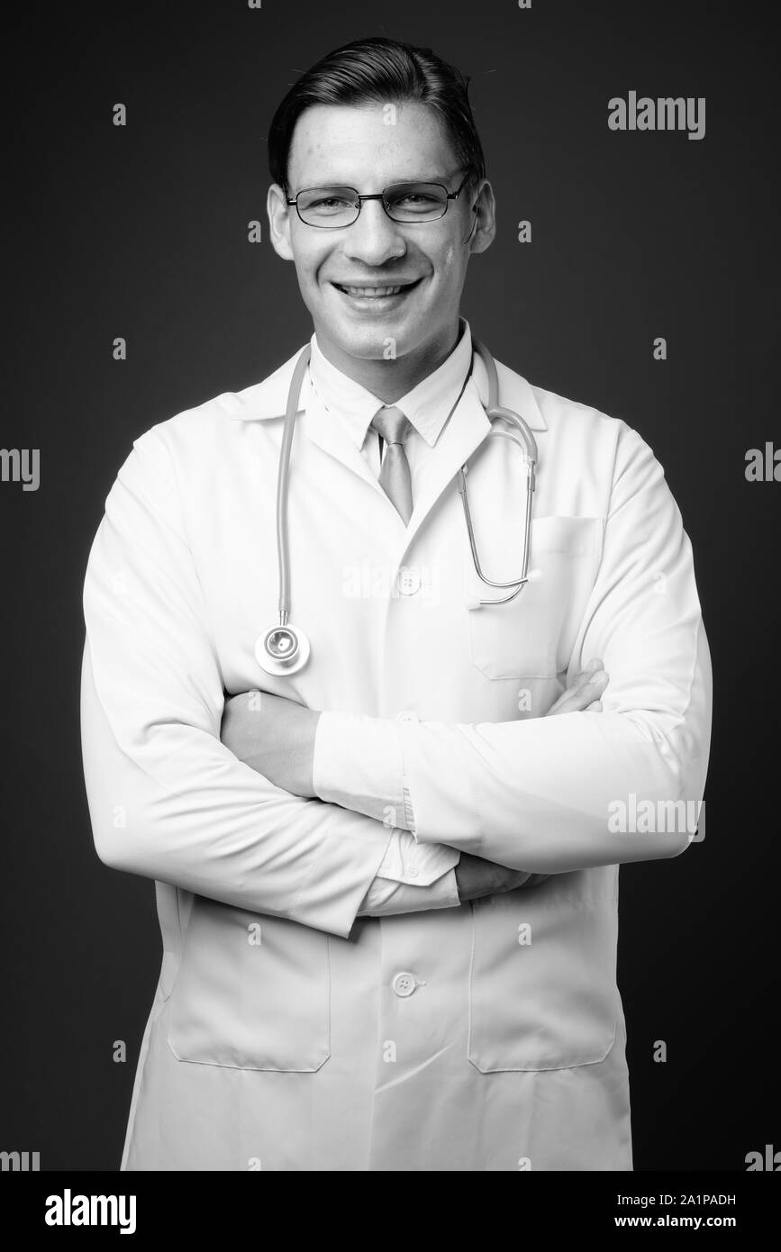 Happy confident doctor man Black and White Stock Photos & Images - Alamy