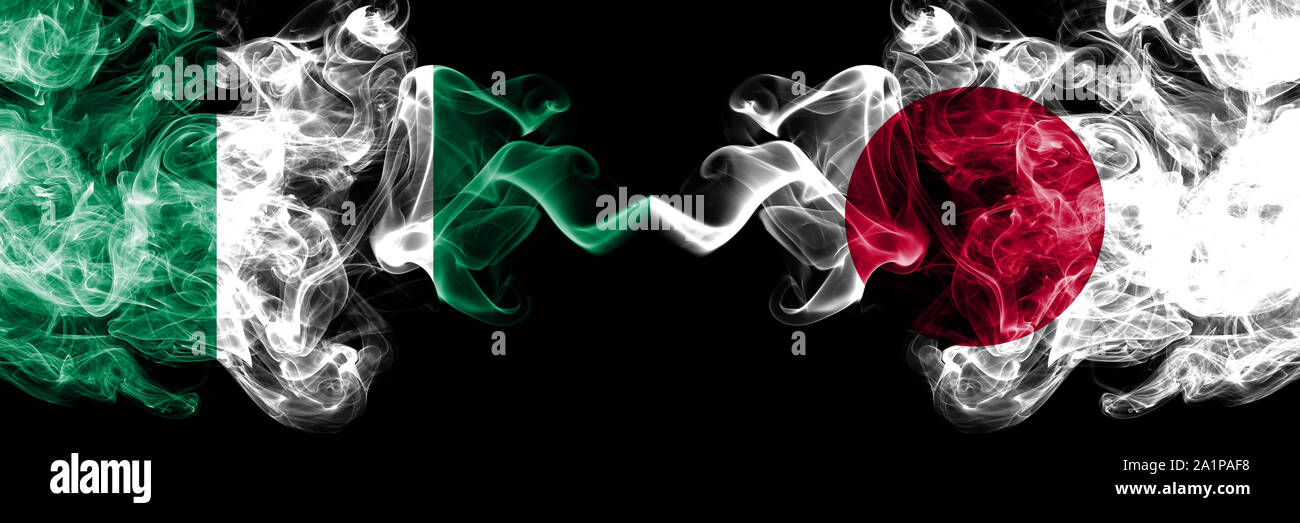 Nigeria vs Japan, Japanese abstract smoky mystic flags placed side by ...