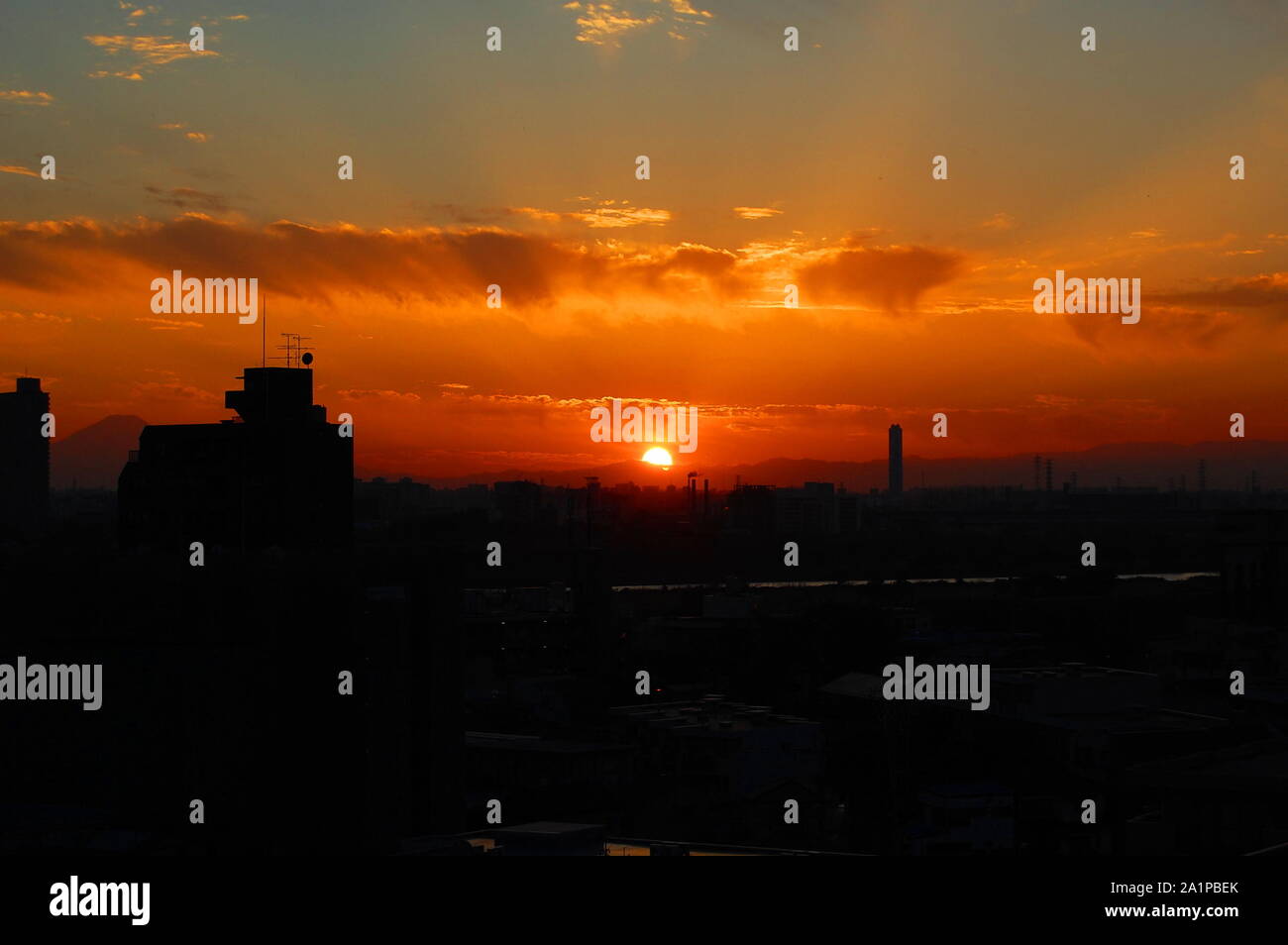 Sunset with red sky and clouds in Japan sky view Stock Photo - Alamy