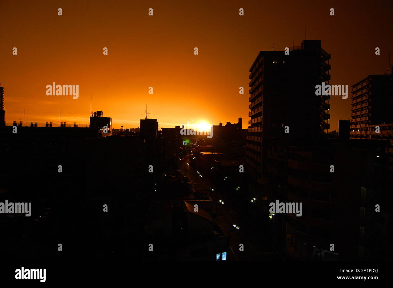 Sunset with Red sun and Clouds afternoon view of the sky Stock Photo ...