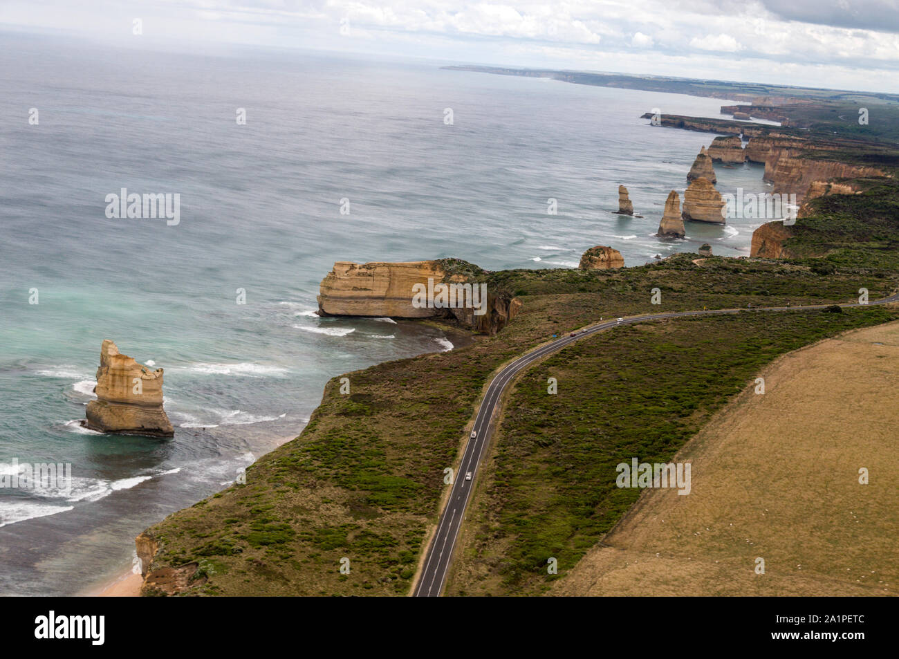 A row of limestone stacks, 45 metres high, known as the Twelve Apostles ...