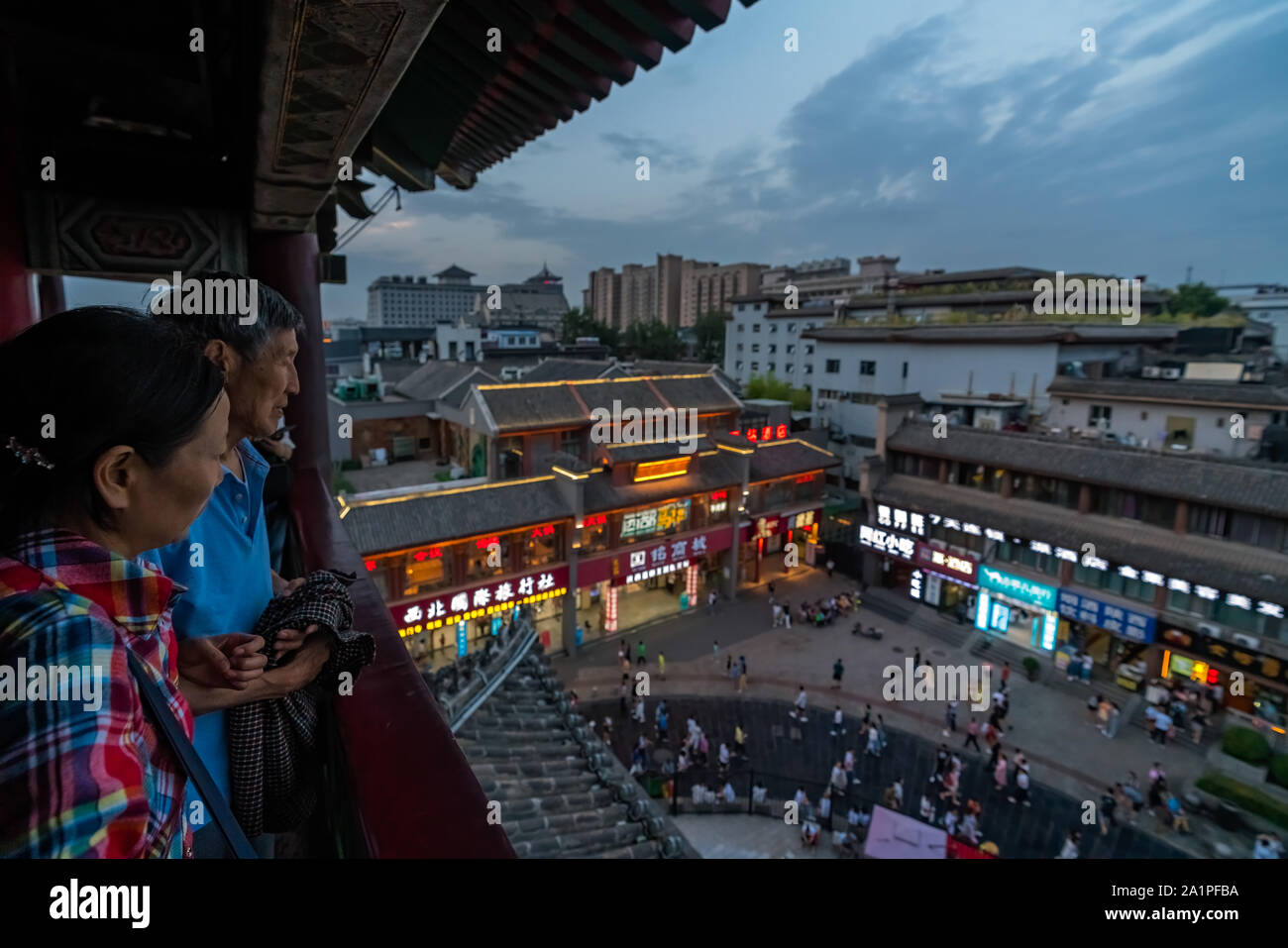 Woman watching sunset balcony hi-res stock photography and images - Alamy