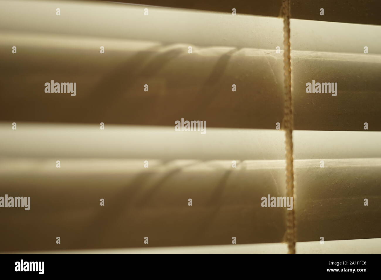 closed horizontal blinds with rope, front view close-up Stock Photo - Alamy