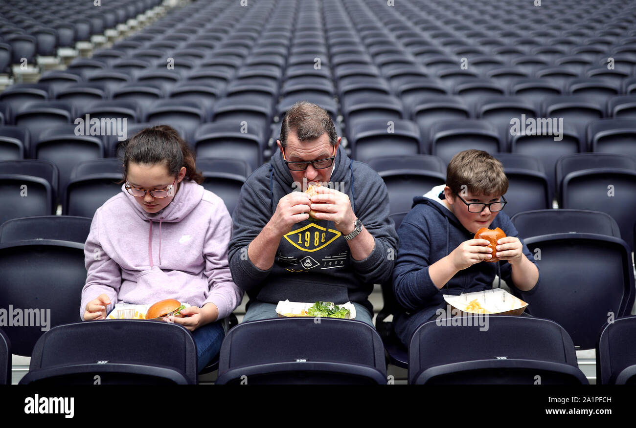 Fans eating in the stands before the Premier League match at the ...