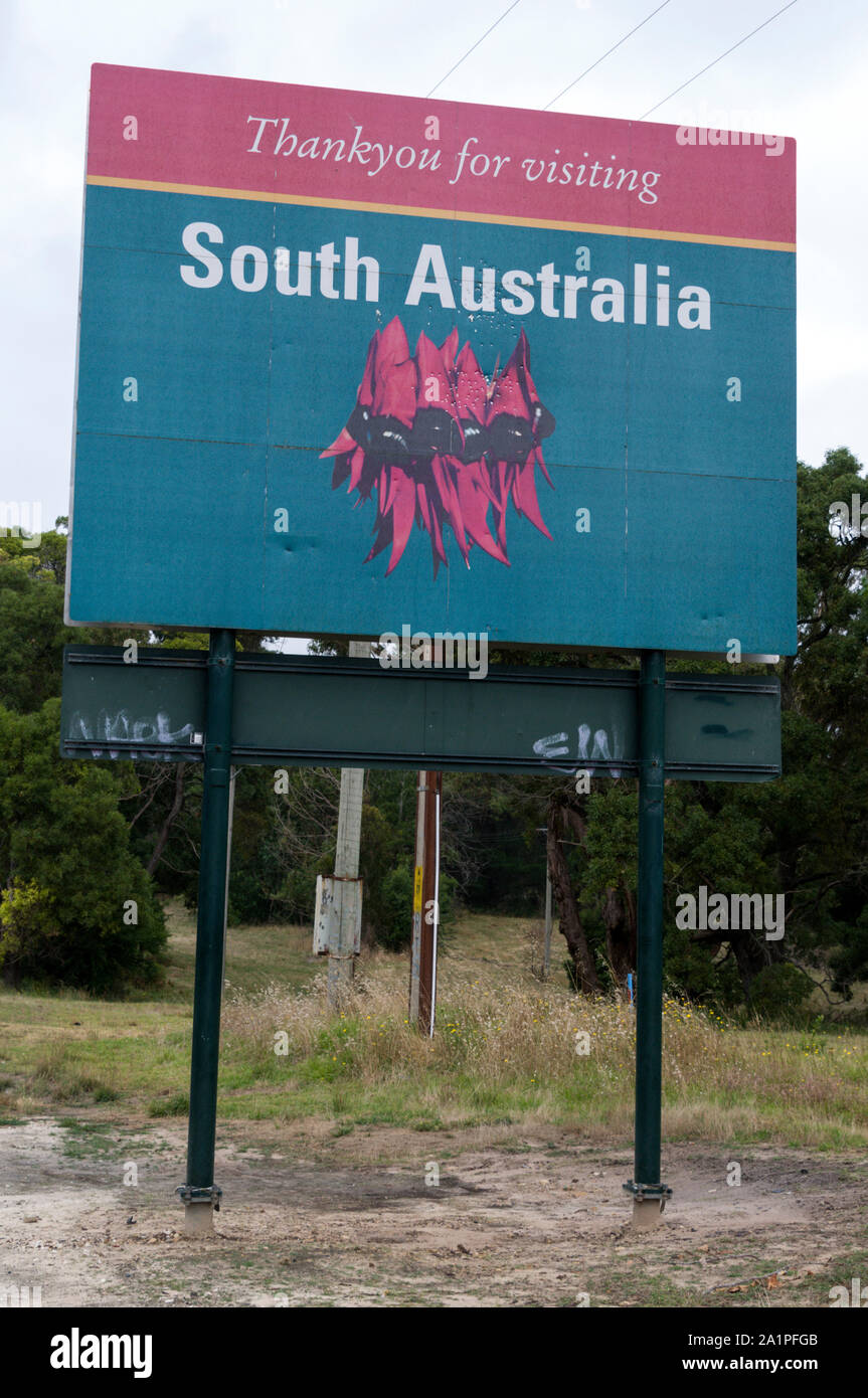 A road sign marking the State of Victoria/ South Australia border on ...