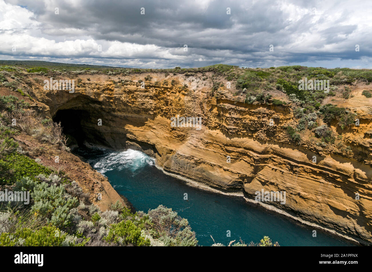 The limestone cliffs of Thunder Cave at the Loch Ard Gorge along the ...