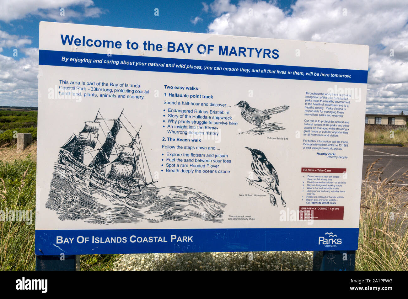 A visitor’s information sign at the Bay of Martyrs in the Bay of ...