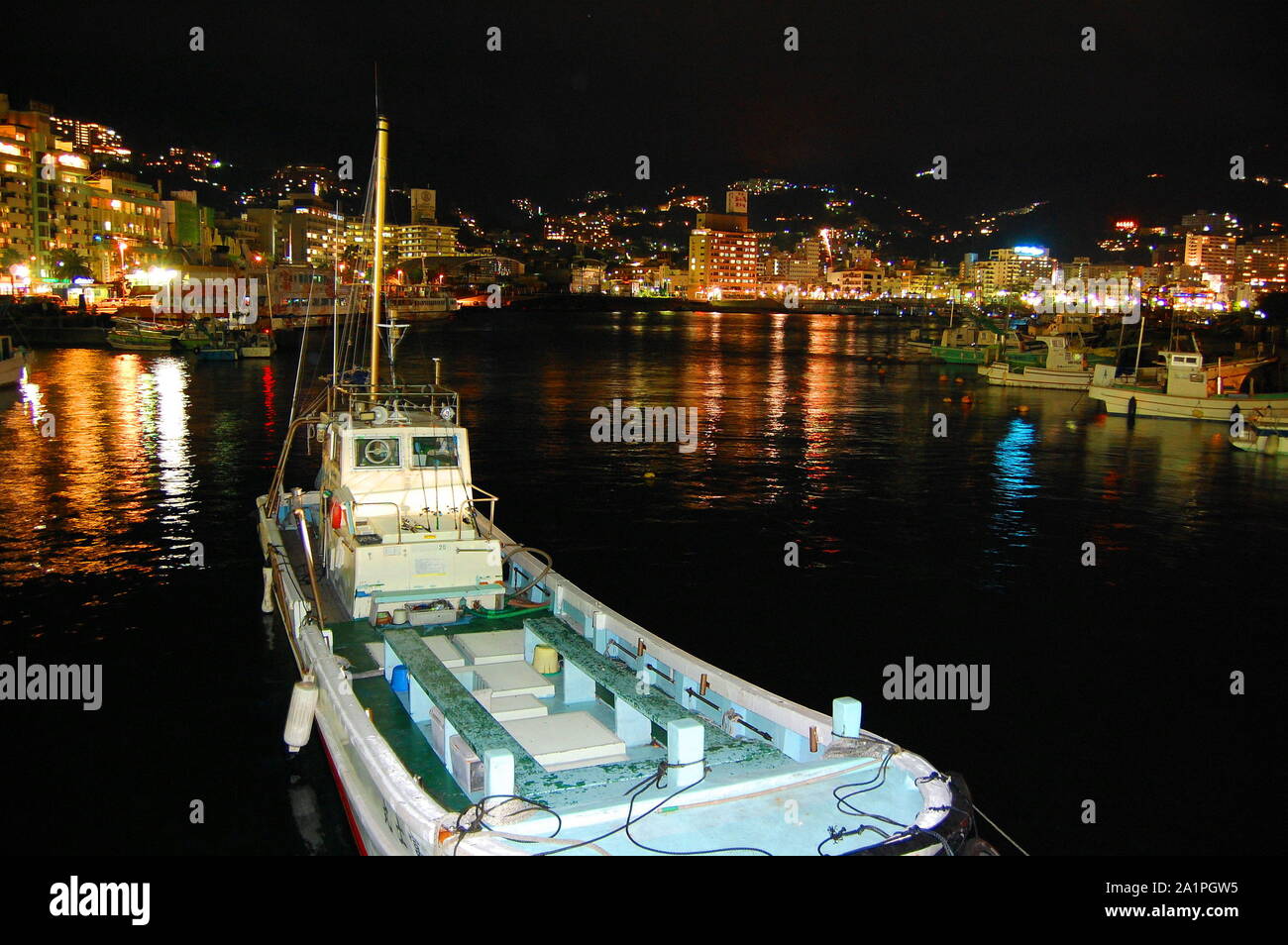 Port night view lights on the seaside Stock Photo - Alamy