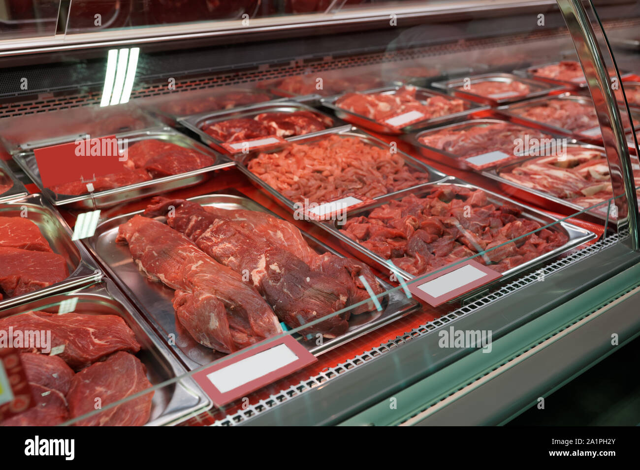 Beef meat in cooled display in food supermarket Stock Photo - Alamy