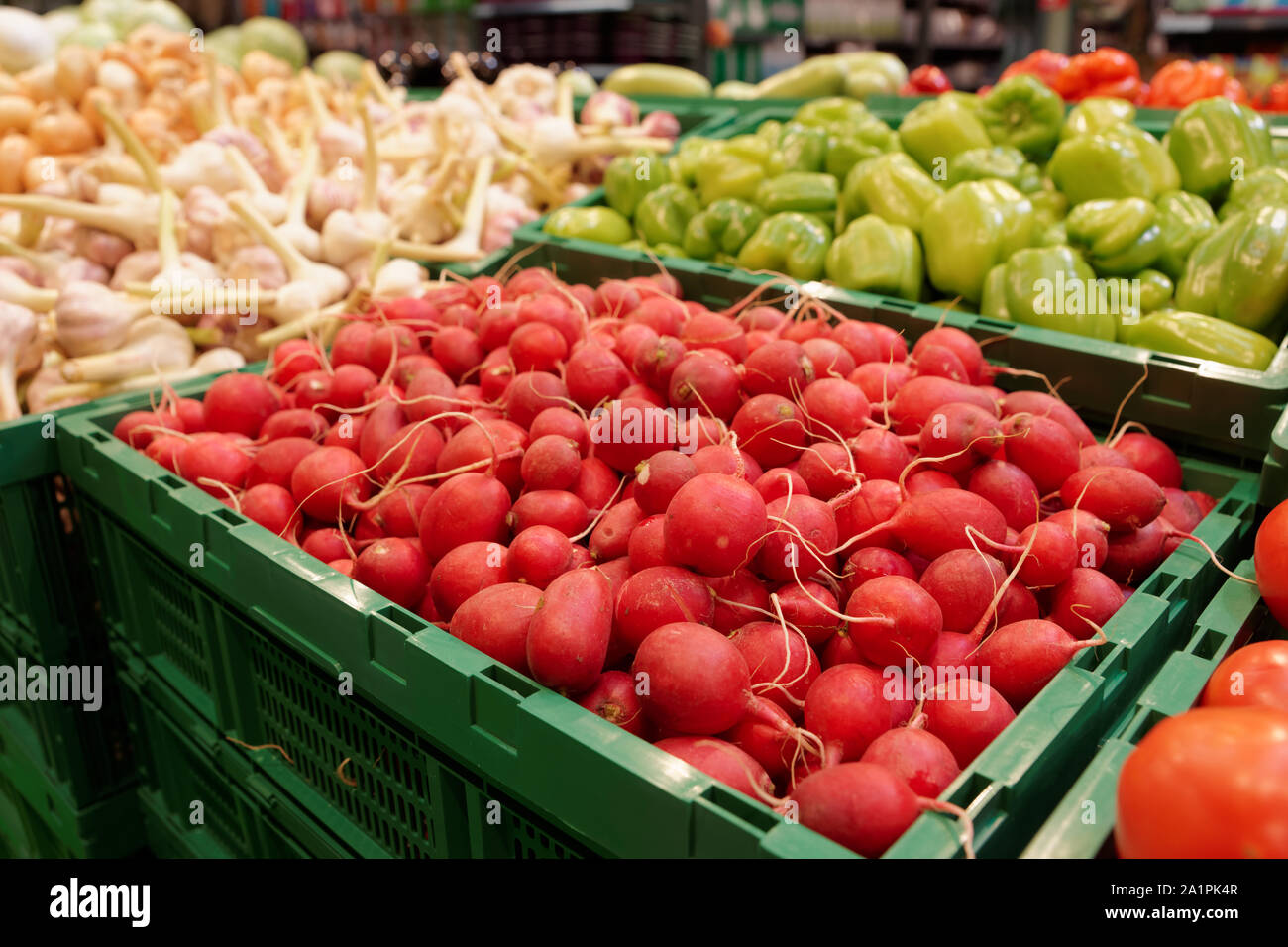 Red radish and another vegetables in supermarket or grocery store Stock ...