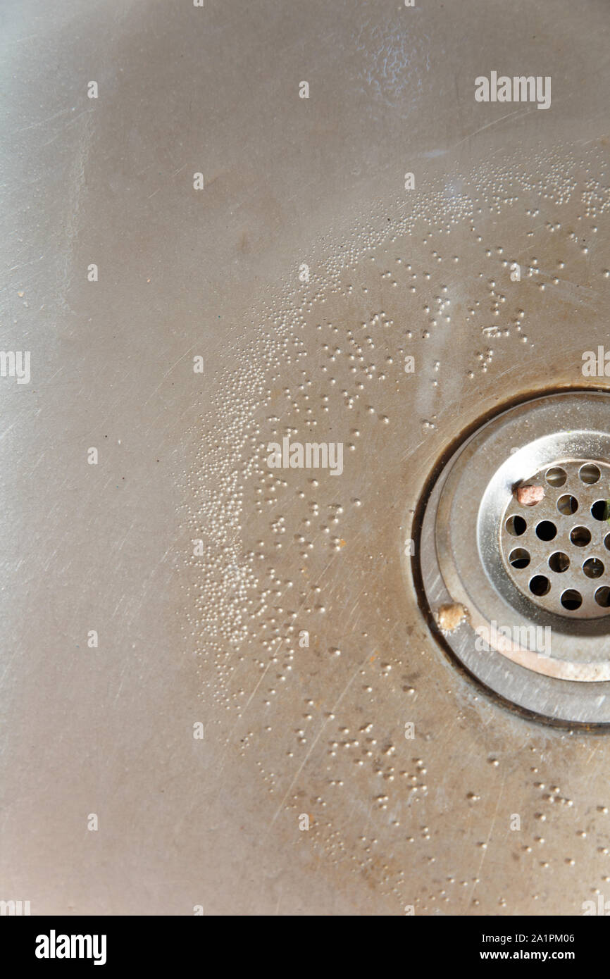 Dirty sink drain with leftover food. Stainless steel sink Stock Photo ...