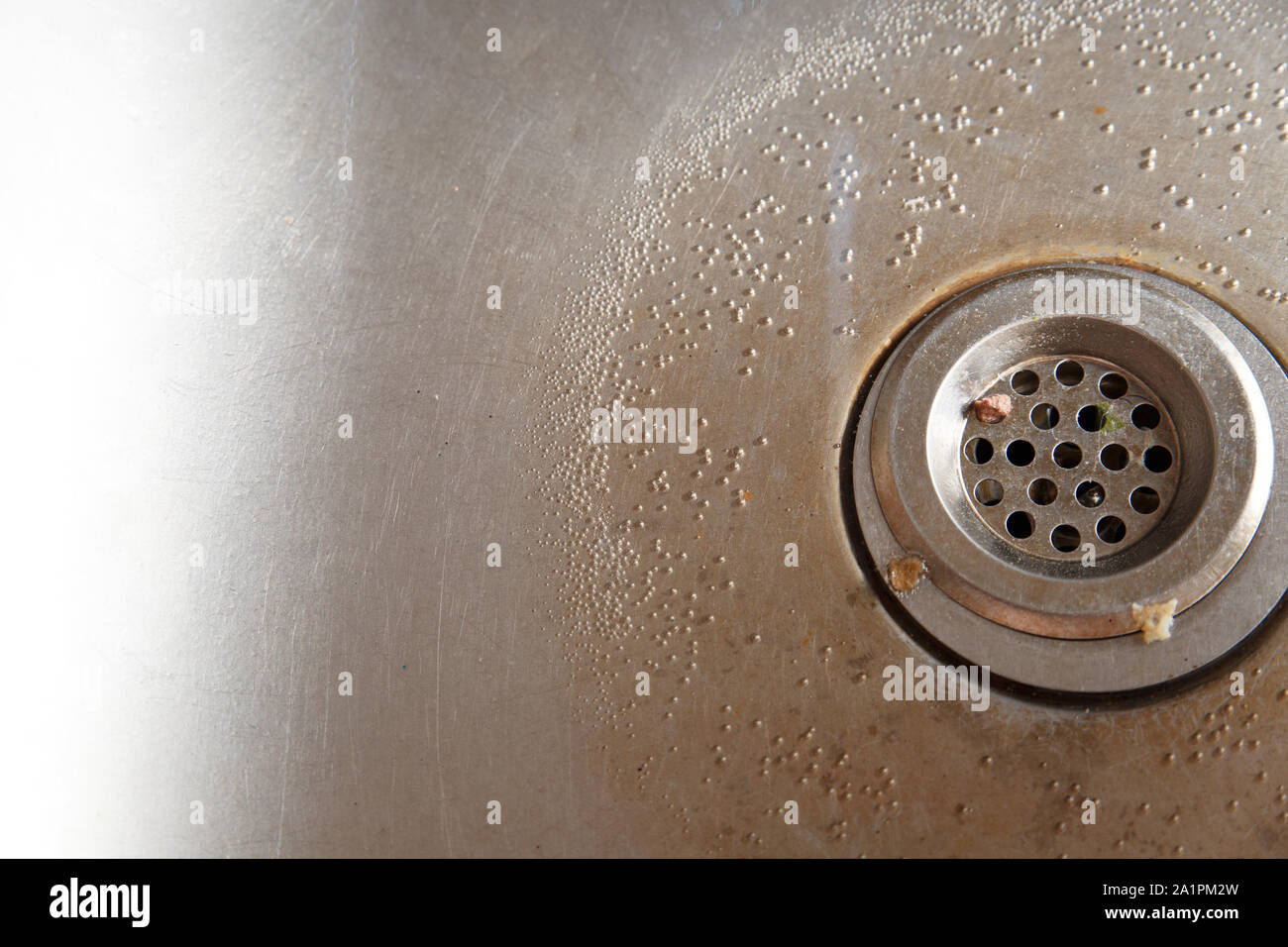 Dirty sink drain with leftover food. Stainless steel sink Stock Photo ...