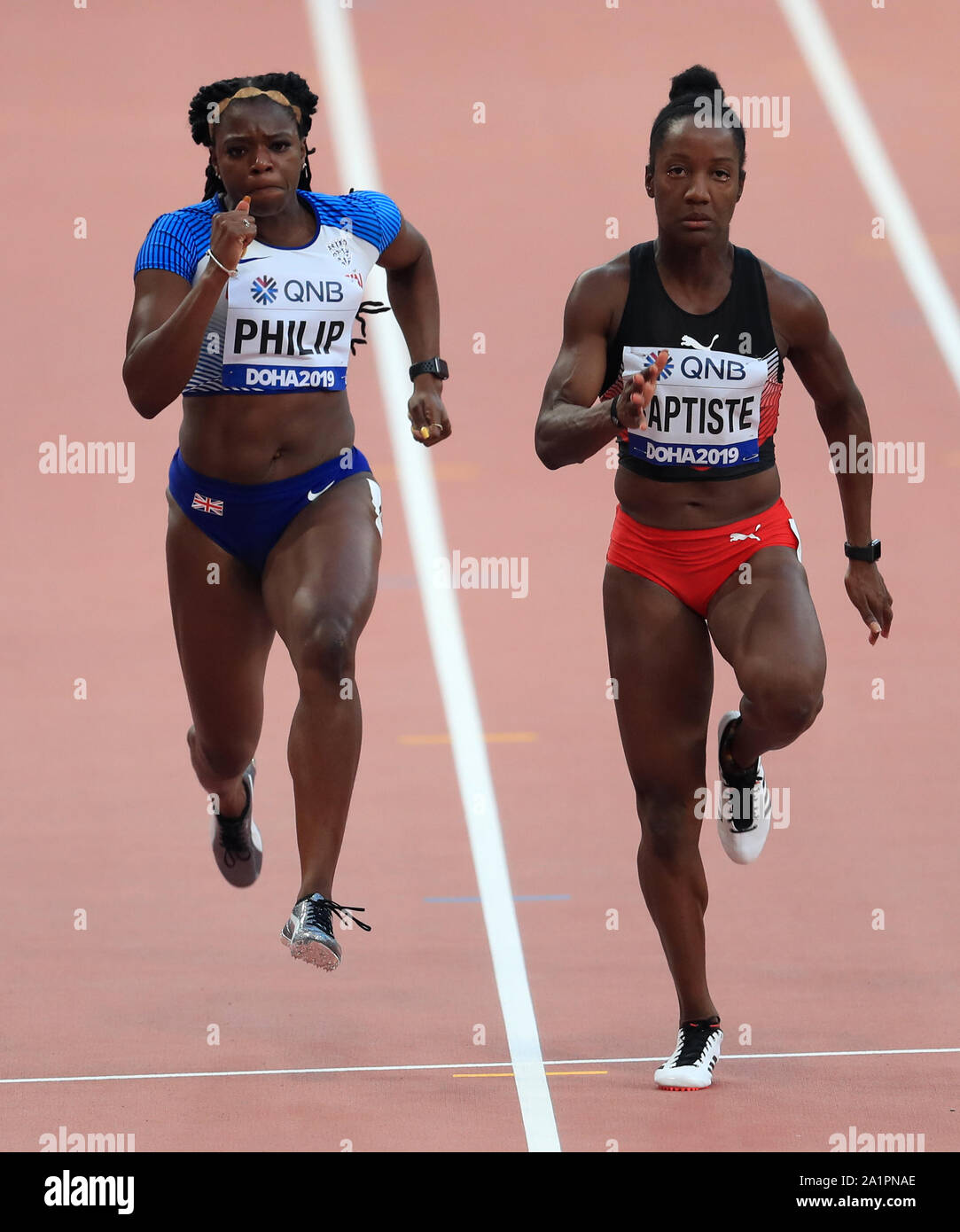 Great Britain's Asha Philip (left) in her Women's 100m heat during day ...