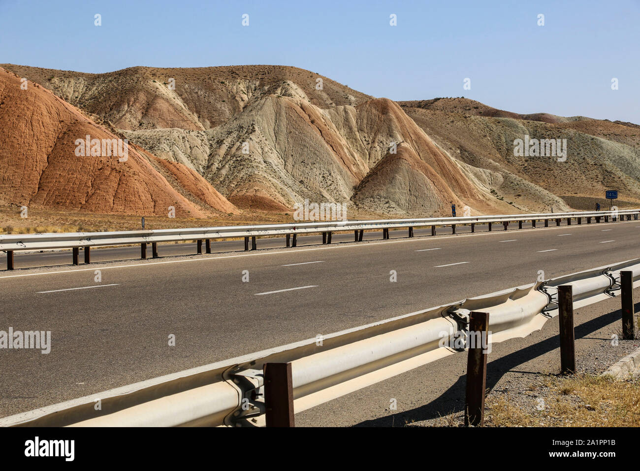 Highway through beautiful colorful mountains similar to eastern spices ...