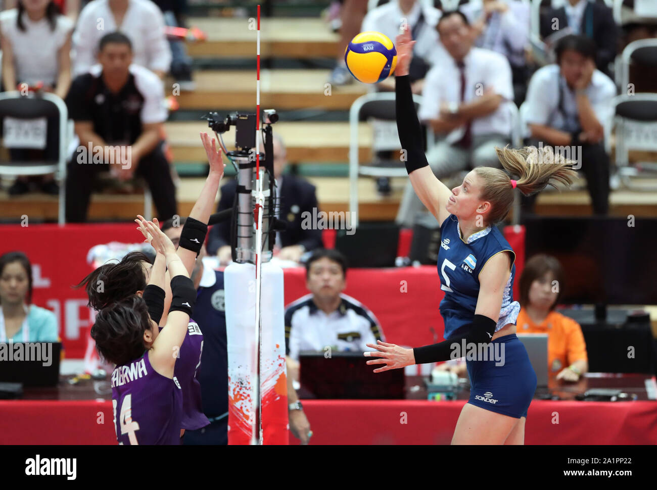 Osaka, Japan. 28th Sep, 2019. Lucia Fresco (R) of Argentina spikes the ...
