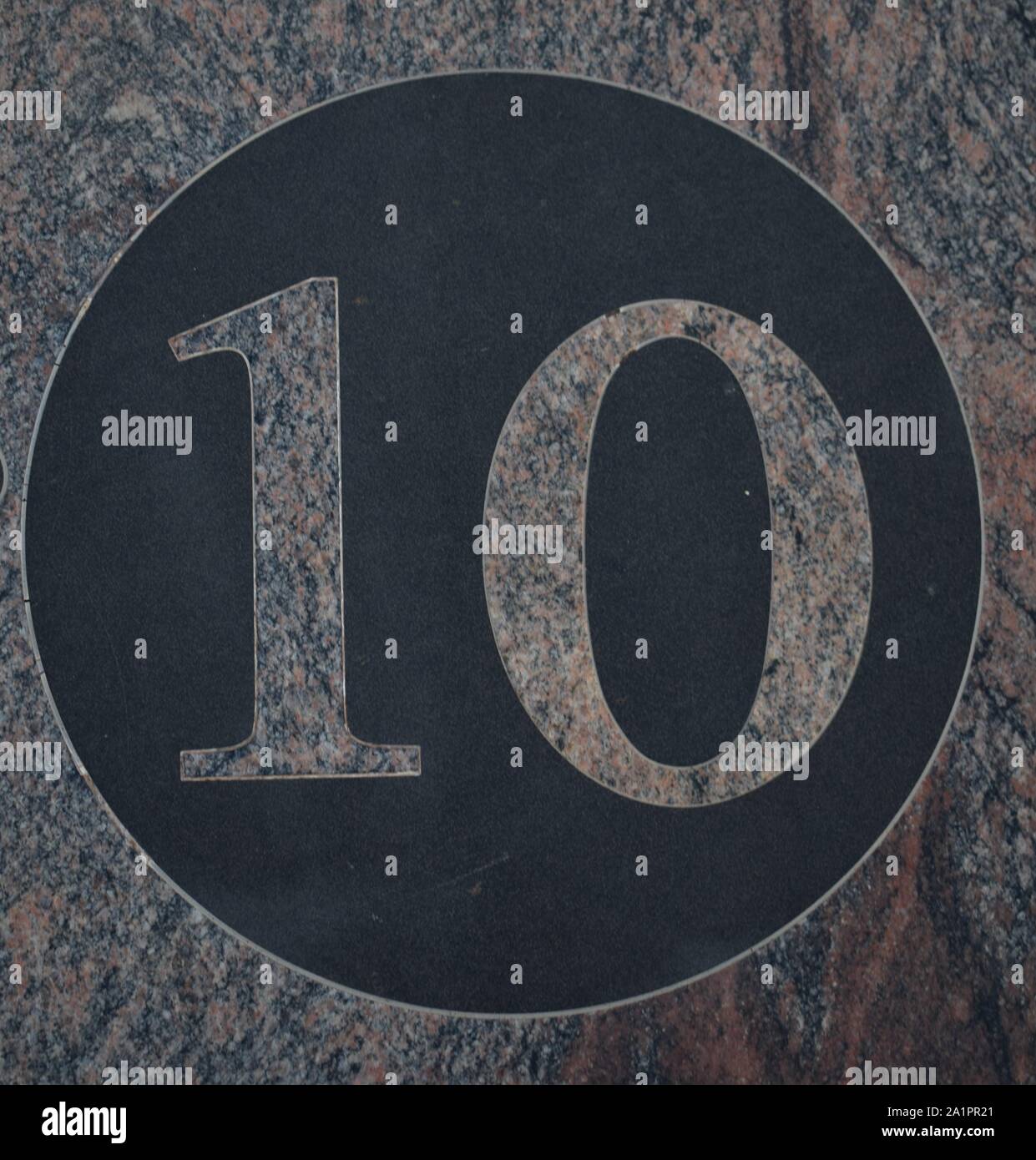 10, Pink marble number within a circle of black marble, pink marble ...