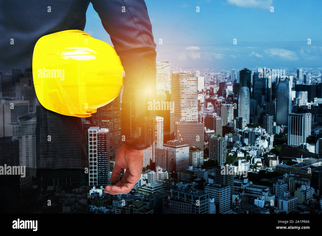 Engineer in suit holding helmet hi-res stock photography and images - Alamy