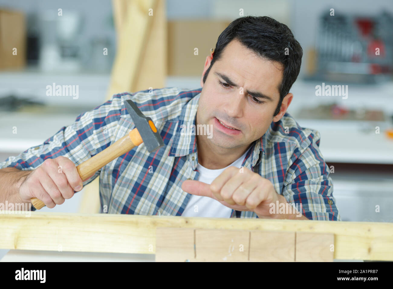 Hit finger with hammer hi-res stock photography and images - Alamy