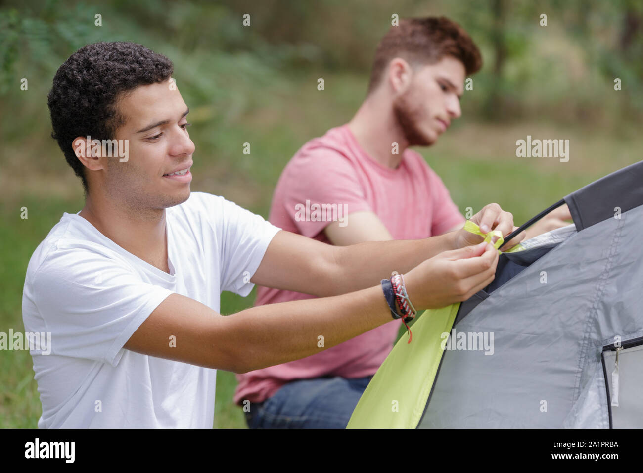 Erecting tent hi-res stock photography and images - Alamy