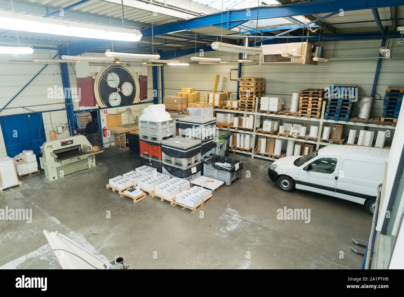 white van inside factory building Stock Photo - Alamy