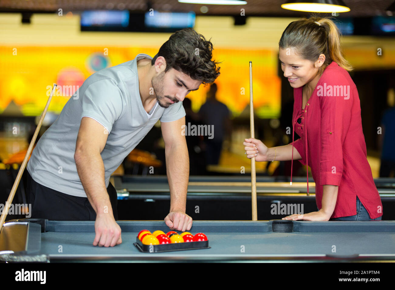 Young man shooting pool billiard hi-res stock photography and images ...