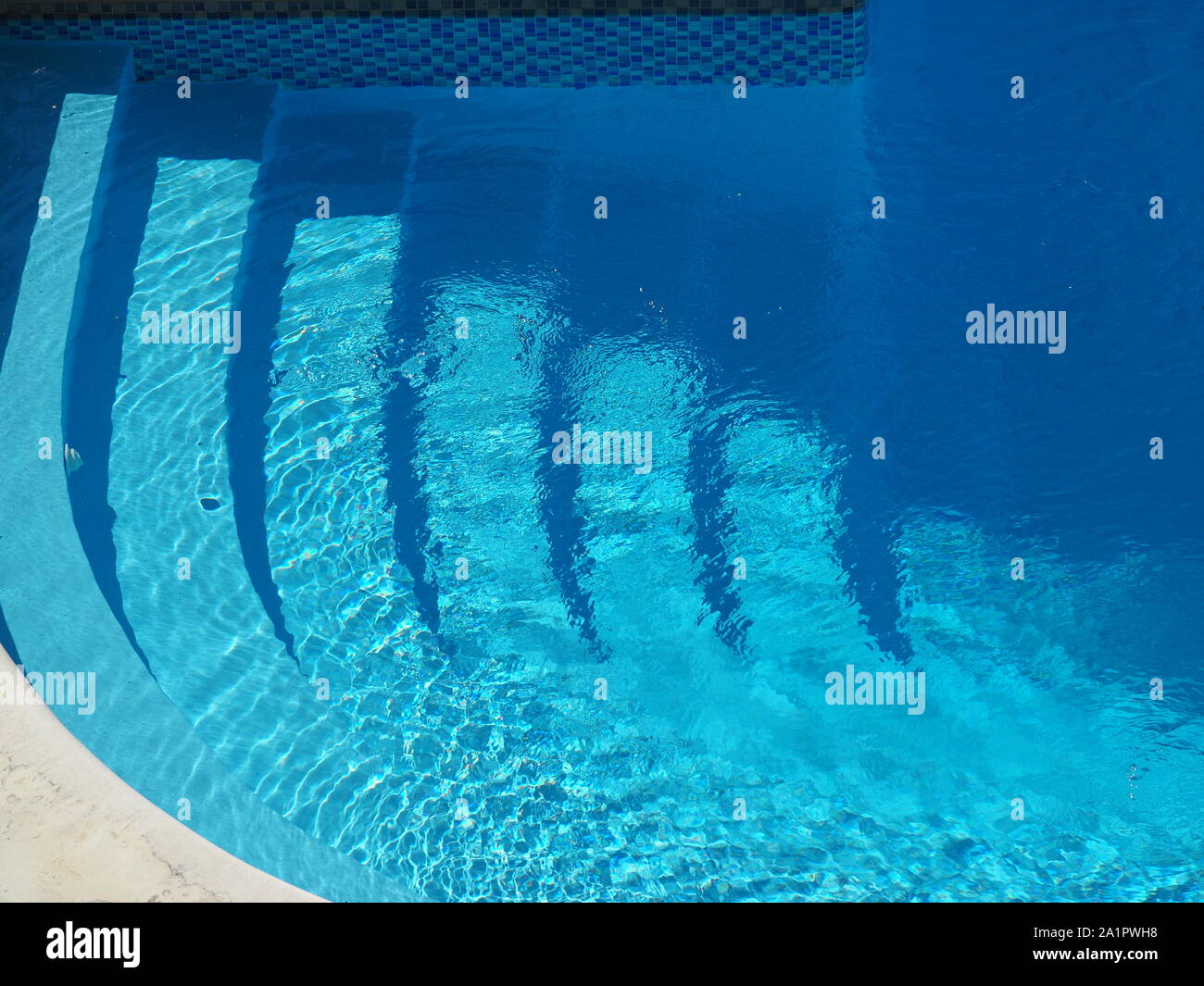 Steps to the swimming pool. View from above Stock Photo - Alamy
