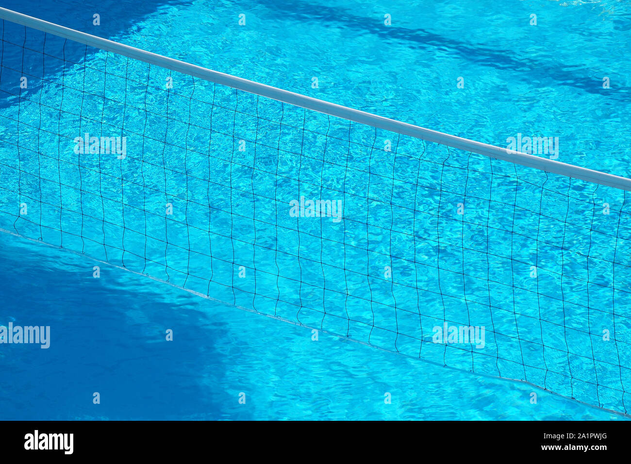 Volleyball net in the swimming pool Stock Photo - Alamy