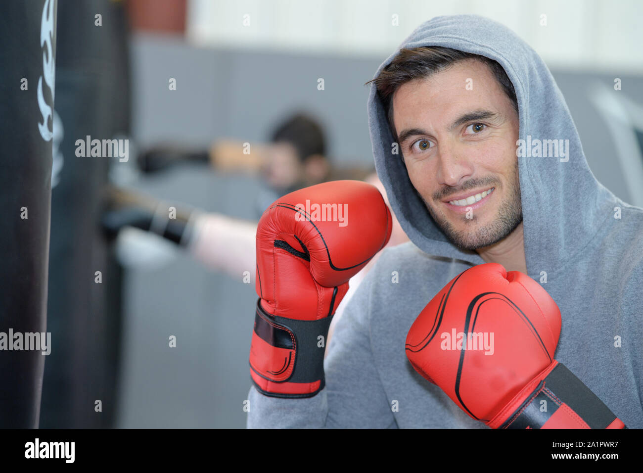 Boxer punching sand bag hi-res stock photography and images - Alamy