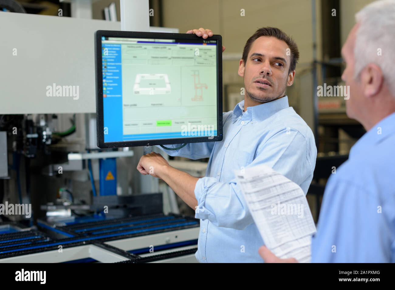 Hands screen printing hi-res stock photography and images - Alamy