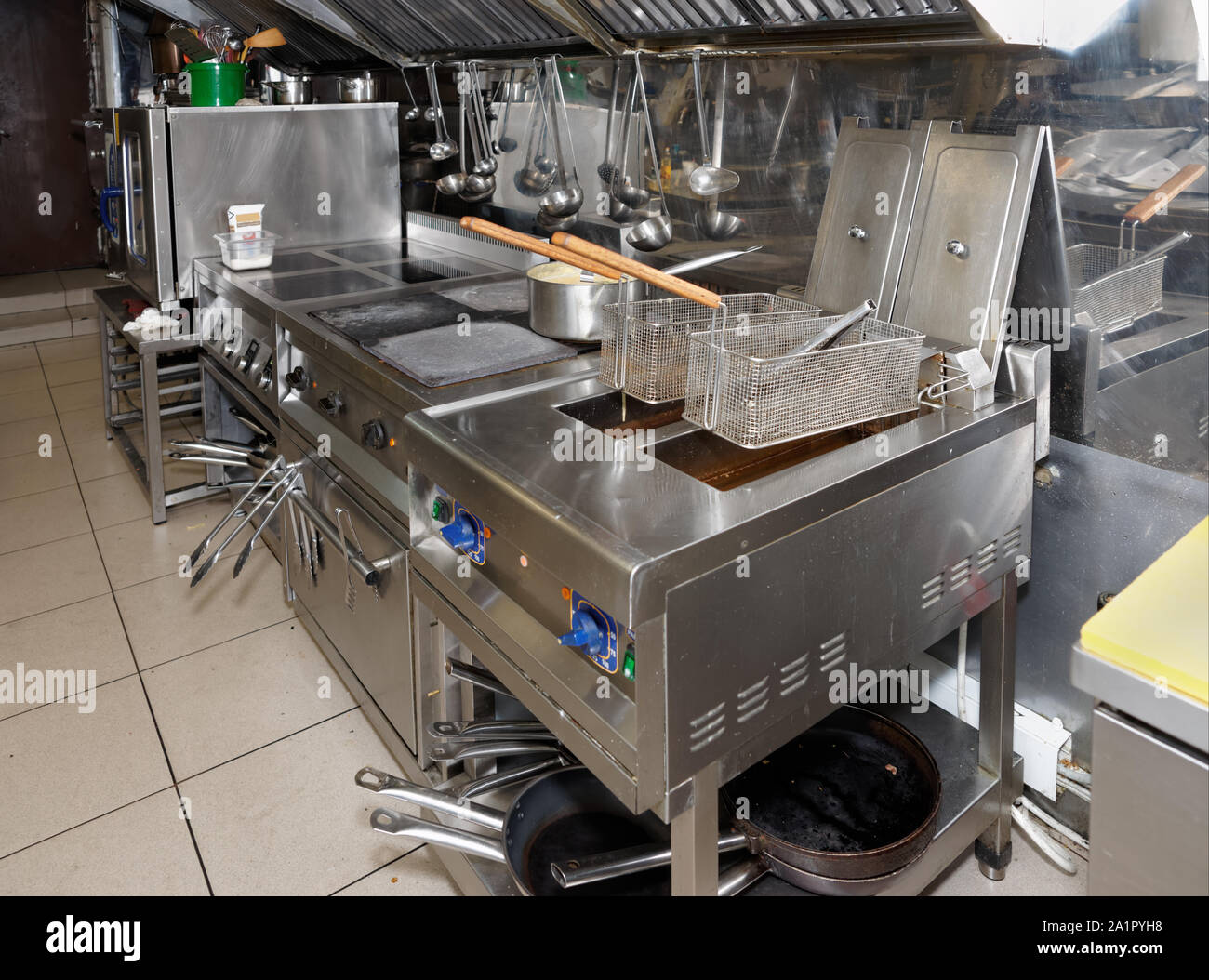 Typical and not too clean restaurant kitchen Stock Photo - Alamy